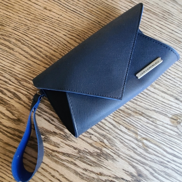 Jantaminau | Bags | Jantaminau Klm Blue Vinyl Clutch | Poshmark